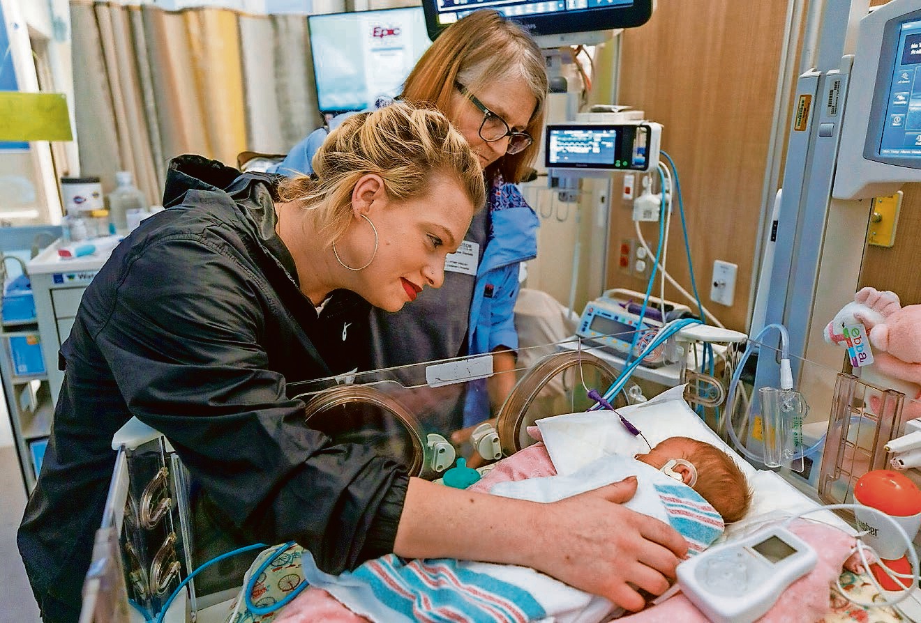 lindsay pate daniels embraces her daughter emma pate moore while ...