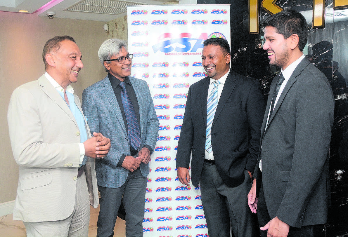 Vasant Bharath vice chairman of SCA, left, Curtis Mohammed executive ...
