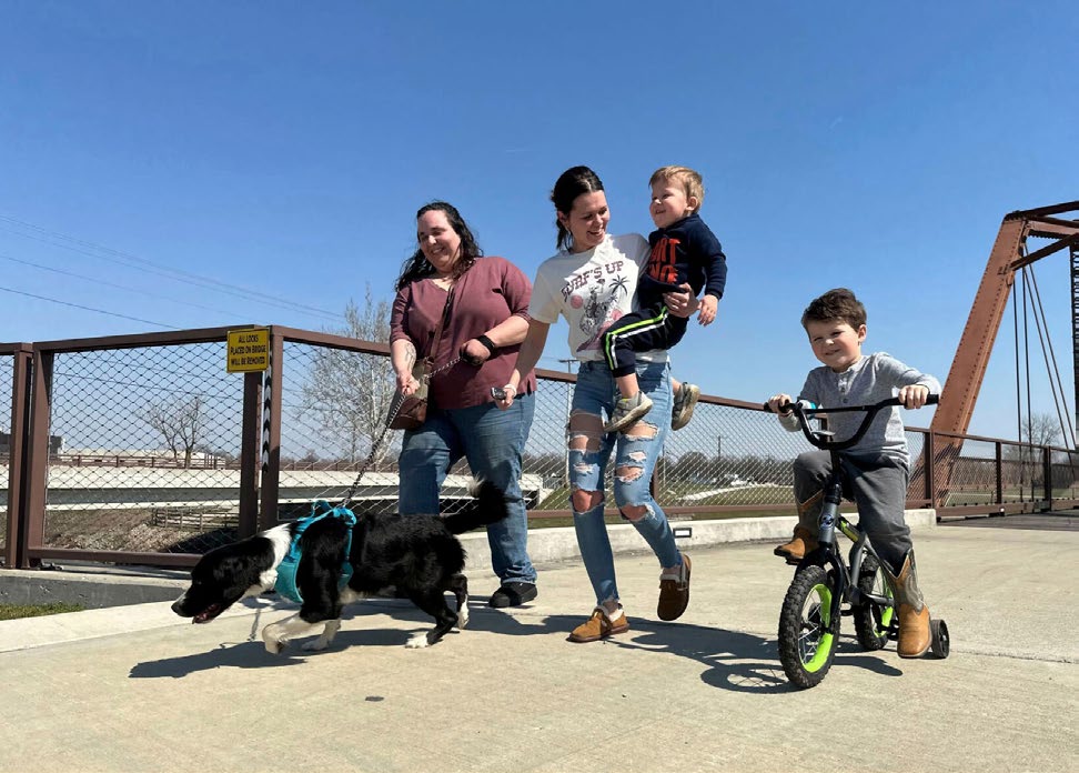 isabella volmert ap from left emerson howard and dog dixie enjoy a walk ...